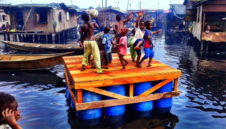 3-Story Floating School in Nigeria Rides on Recycled Barrels - WebUrbanist