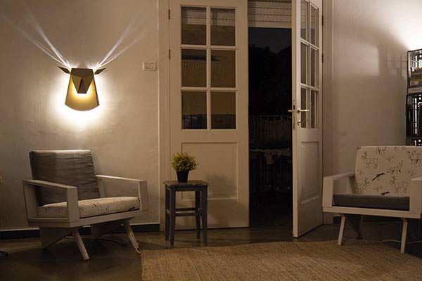 Head Light: Popup Wall Lamp Has Horns that Glow in Shadows | Urbanist