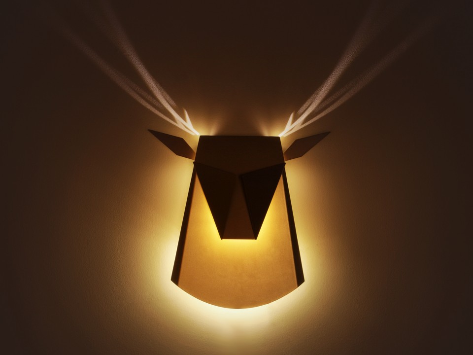 Head Light: Popup Wall Lamp Has Horns that Glow in Shadows - WebUrbanist