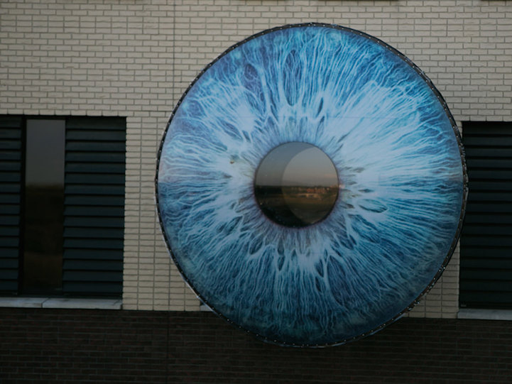 Eye on the City: Visitors Dangle from Urban Art Installation - WebUrbanist