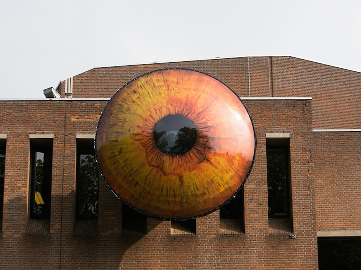 Eye on the City: Visitors Dangle from Urban Art Installation - WebUrbanist