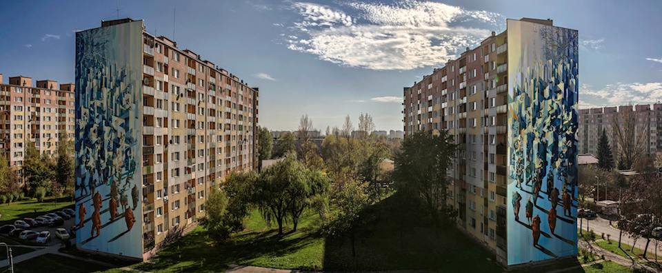 Towers Transformed: Massive Geometric Mural Collaboration - WebUrbanist