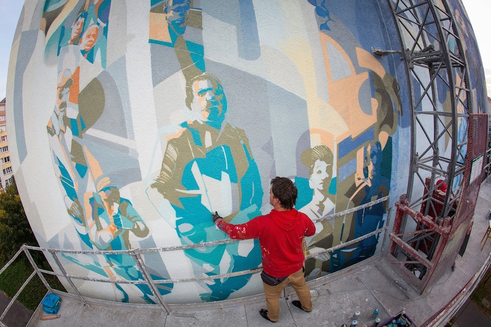 Towers Transformed: Massive Geometric Mural Collaboration - WebUrbanist
