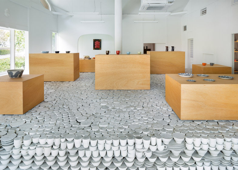 Stacked Ceramics: Shop Floor Made from 25,000 Pieces of Pottery | Urbanist