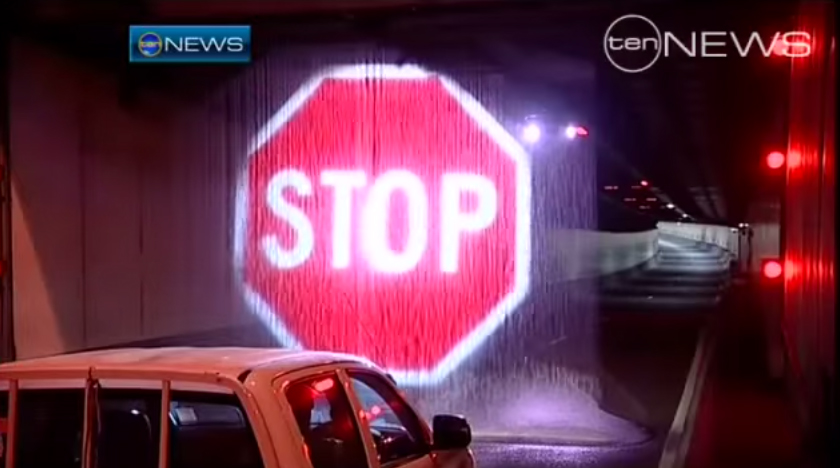 Liquid Stop Sign: Emergency Laser Projection on Sheet of Water ...