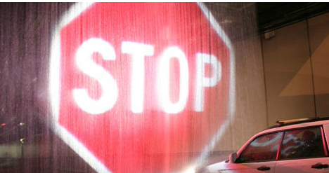 Liquid Stop Sign: Emergency Laser Projection on Sheet of Water ...