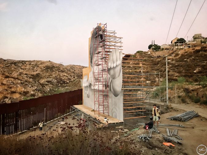 A Toddler Peers Over the US-Mexico Border Fence for JR’s Latest ...