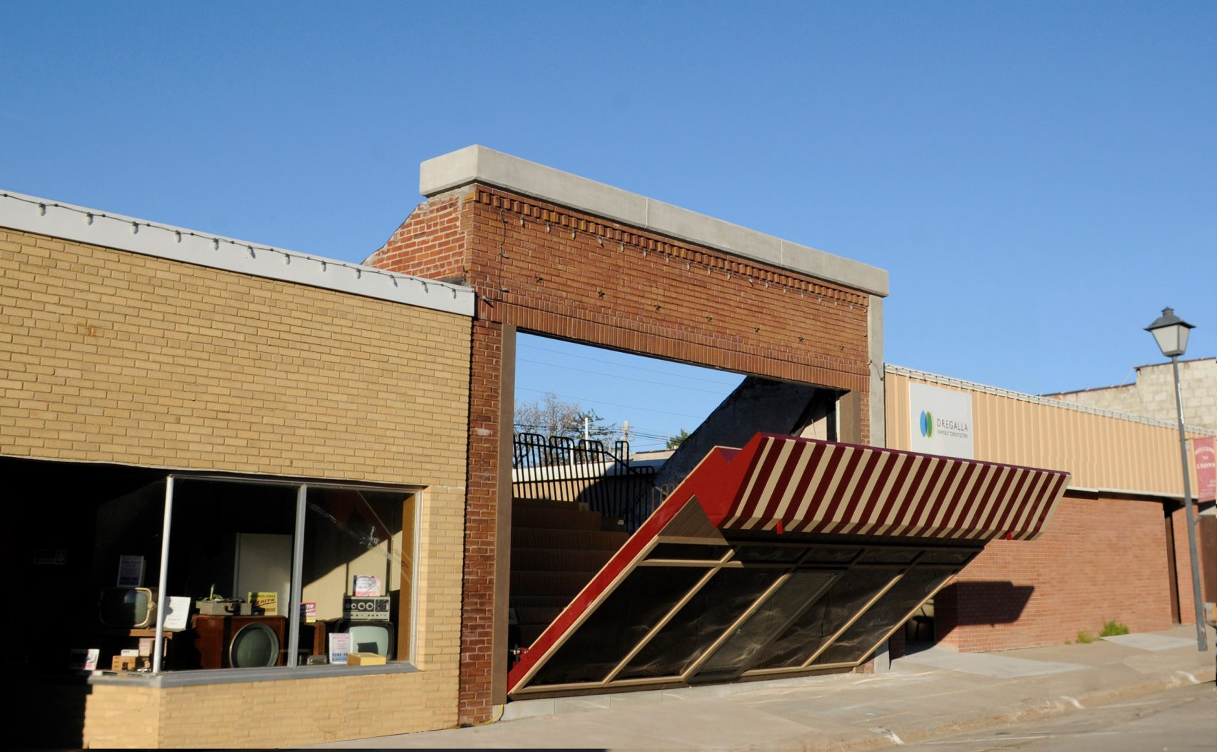 WebUrbanist — Thin Facade: Old Small Town Storefront Folds Down...