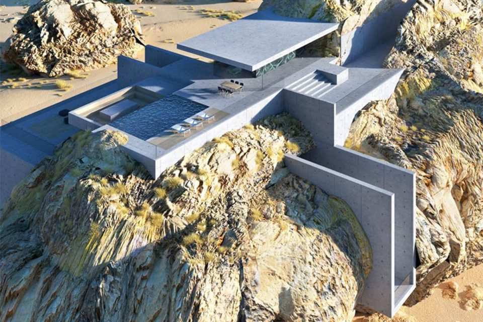 House Inside a Rock Takes Inspiration from Ancient Sandstone Tombs ...